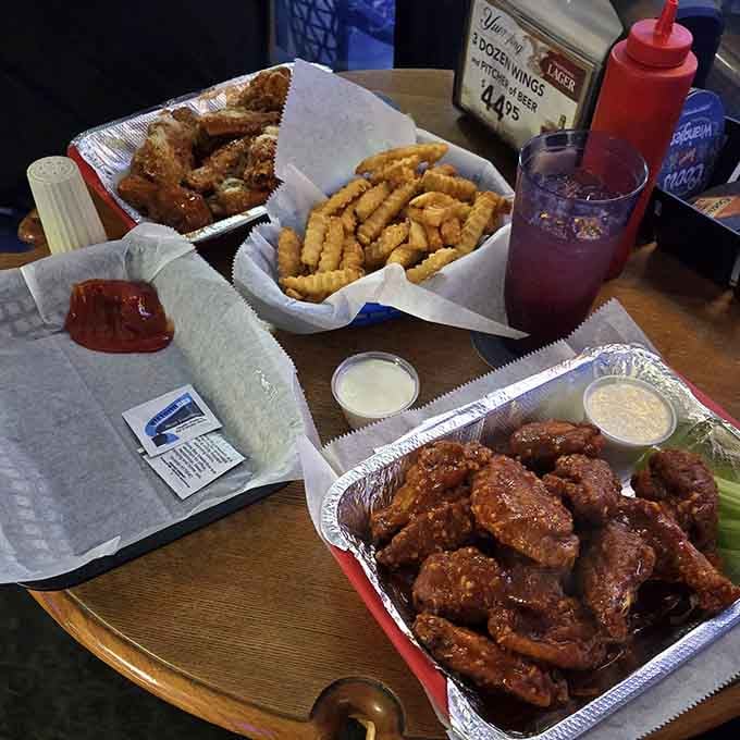 This spread of wings, fries, and pure happiness is what Friday nights were invented for, friends.