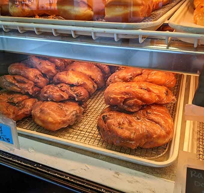 These aren't fritters, they're golden pillows of apple-cinnamon bliss that belong in a pastry hall of fame.