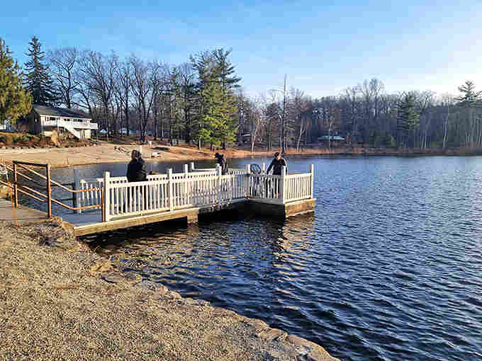 The fishing dock offers front-row seats to nature's daily show, no streaming subscription required for this entertainment.