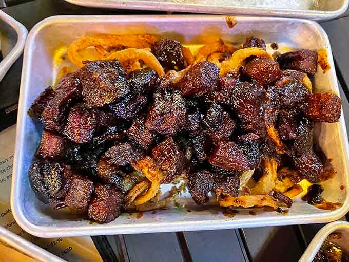 Burnt ends piled high like smoky treasure, each caramelized cube a testament to patience and the magic of low-and-slow cooking.