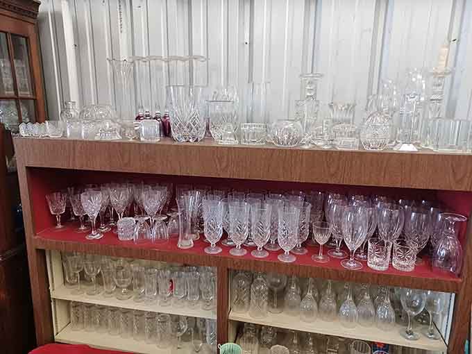 Crystal glassware lined up like soldiers, ready to elevate your next dinner party from ordinary to extraordinary.