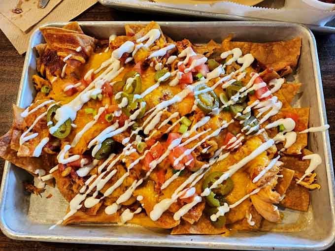 Nachos loaded with barbecue and drizzled with sauce, because sometimes fusion is exactly what dinner needs.