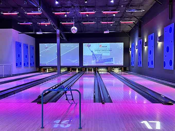 Bowling lanes bathed in purple light, because regular bowling is so last century, don't you think?