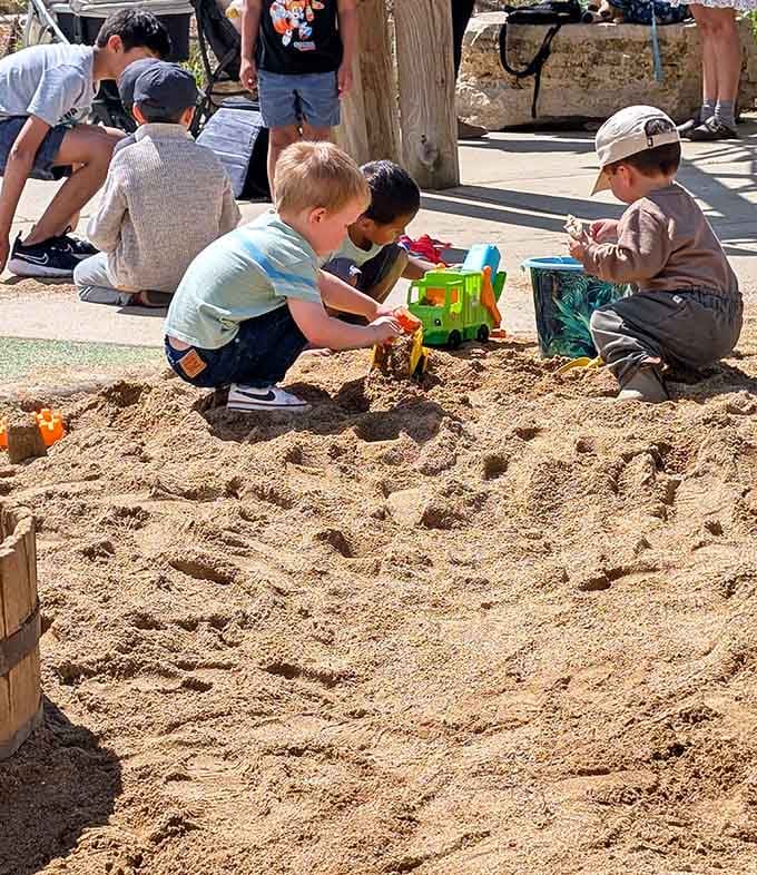 Sand becomes engineering labs where future architects learn physics through play, getting gloriously messy in the process.