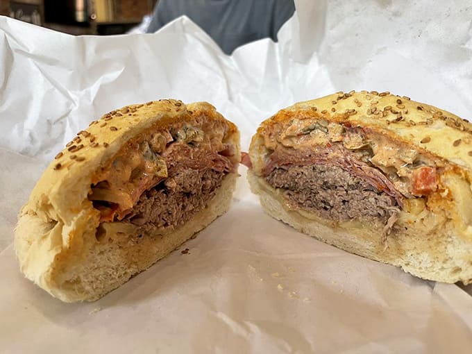 The Knuckle Sandwich: proof that sometimes the best things in life require both hands and zero dignity.
