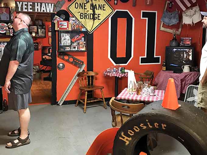 Polished floor and bright orange walls set the stage for serious television nostalgia ahead.