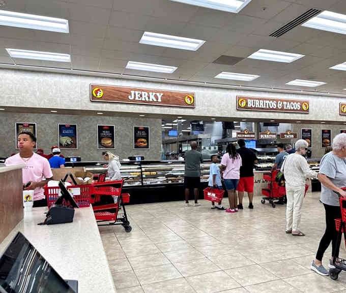 The food counter draws crowds like a deli at lunchtime, serving fresh brisket where you'd expect stale pretzels.