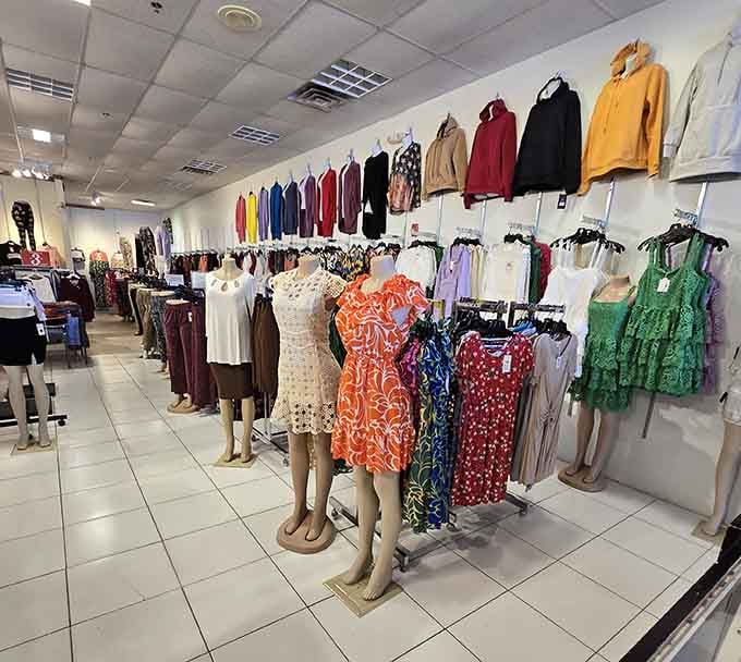Colorful women's apparel hanging like a rainbow of possibilities, each piece whispering "try me on, you know you want to."