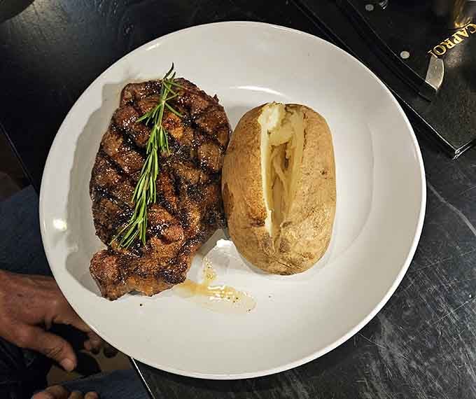 Perfectly grilled steak with those beautiful char marks and a fluffy baked potato, this is what steak dreams are made of.