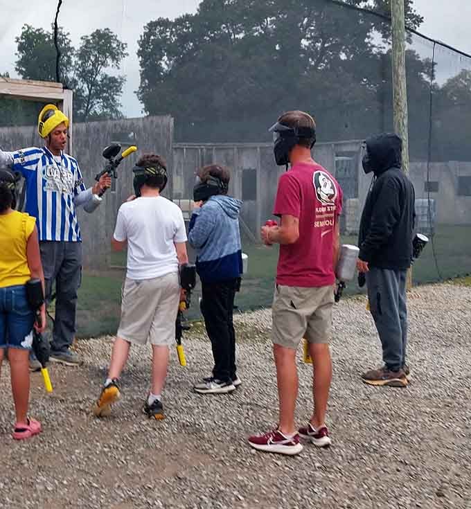 The pre-game huddle where strategies are planned and immediately forgotten once the shooting starts.