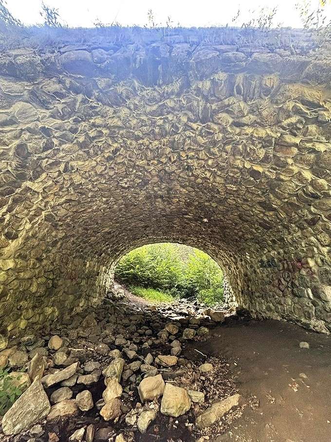 This mysterious stone arch looks like something from a fantasy novel, minus the trolls and questionable bridge tolls.