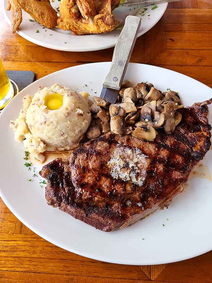 A perfectly grilled steak with mushrooms that proves sometimes the classics can't be improved upon, only perfected.