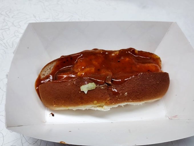 That glossy chili blanket covering this beauty is what dreams are made of, assuming you dream about hot dogs.