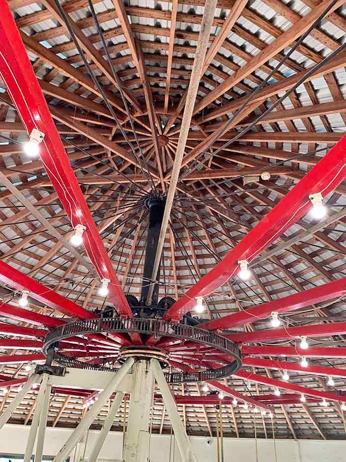 Look up and marvel at the wooden spokes radiating outward like a giant wooden umbrella of happiness.