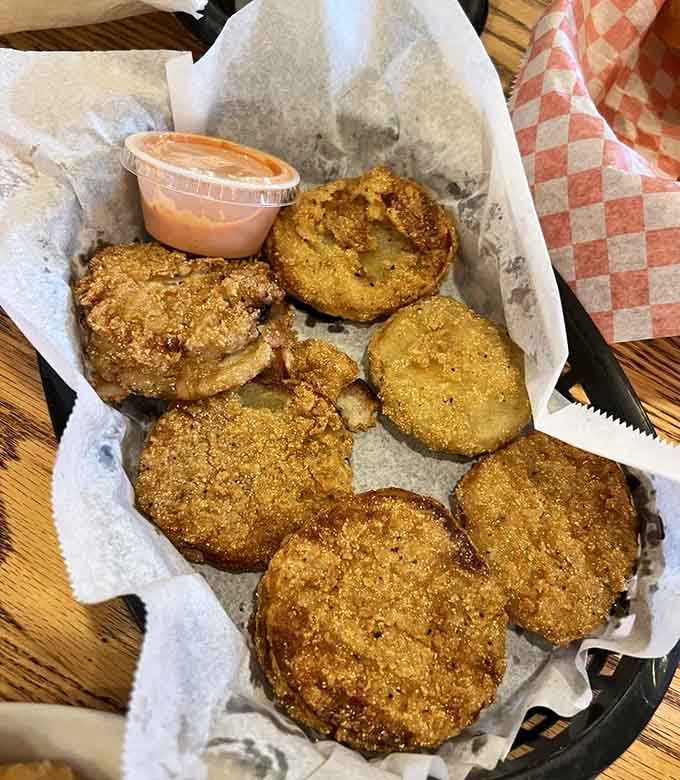 Fried green tomatoes with golden breading that crunches louder than your knees on a cold morning.