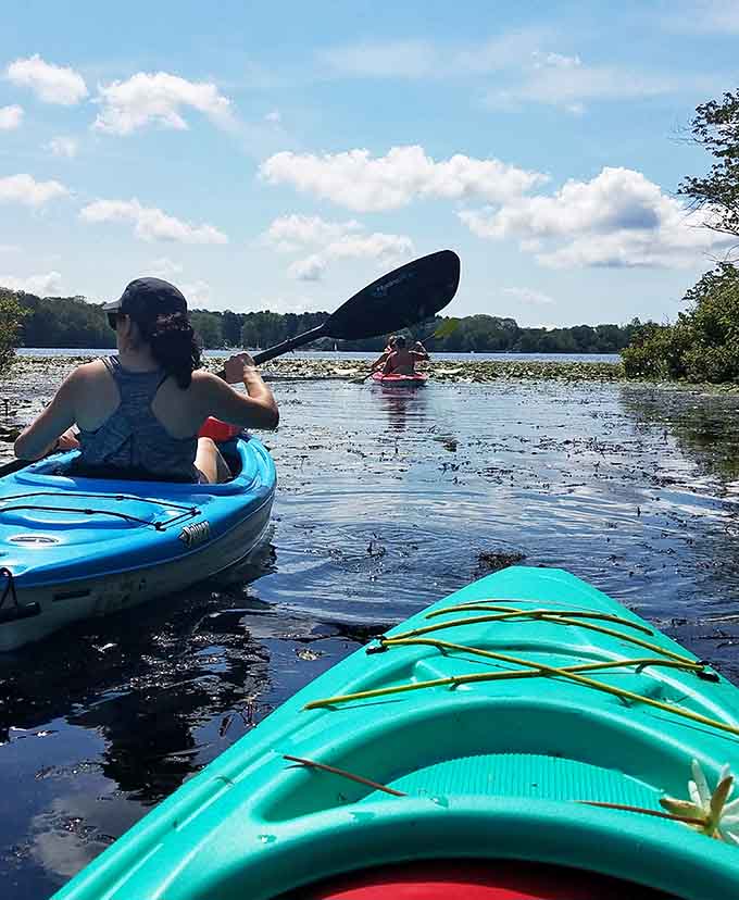 Kayaking Pattaconk Lake offers peaceful paddling and the kind of views that make you forget your troubles.