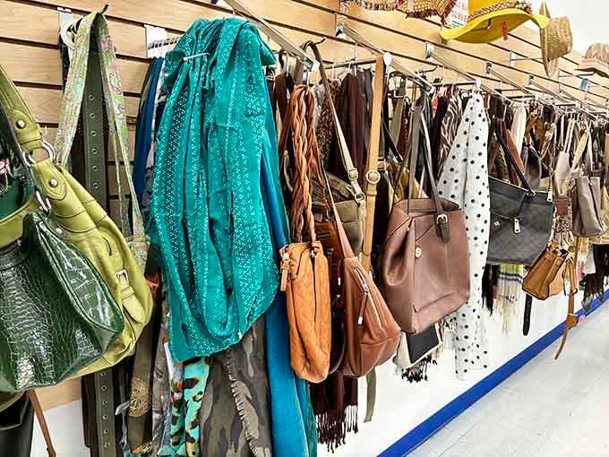 Designer dreams meet thrift store reality in this handbag section that rivals any department store's selection completely.