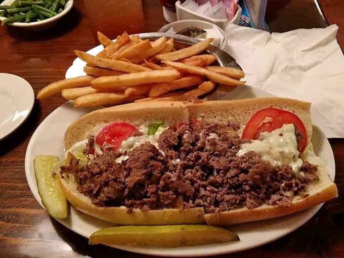 A cheesesteak this loaded requires both hands and possibly a game plan before you dive in.