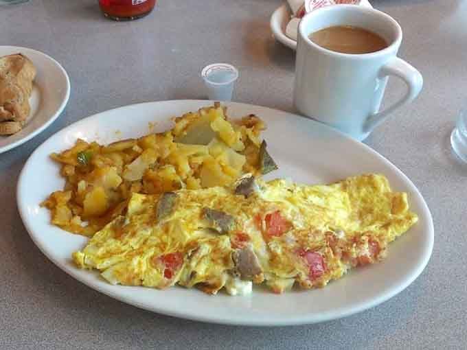 Fluffy omelets and perfectly crispy home fries prove breakfast here is serious business worth waking up for.