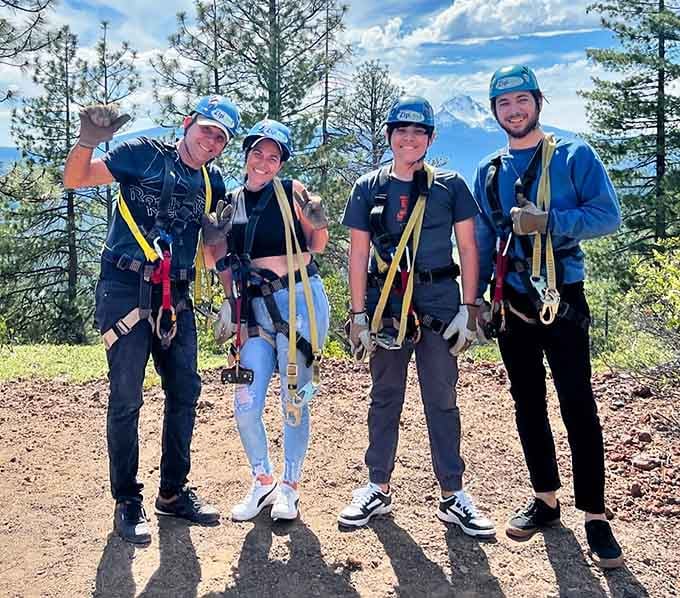 Geared up and grinning, because nothing says "we're about to have an amazing day" quite like matching harnesses.