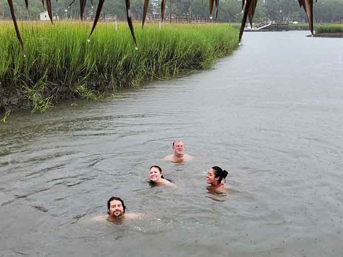 Some folks take a dip right off the tiki boat, turning a leisurely cruise into an impromptu swimming adventure.
