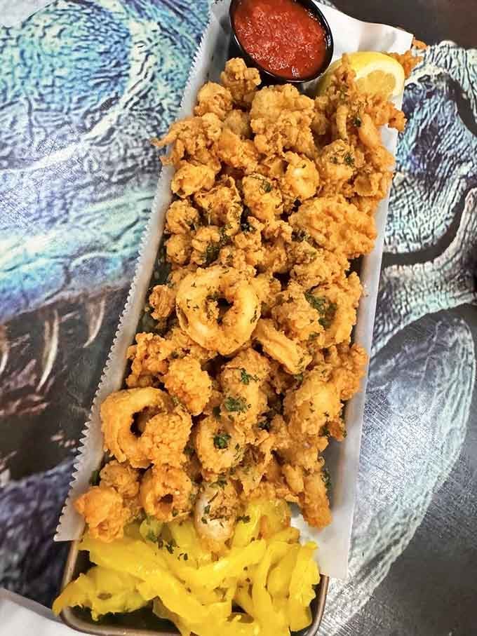 Golden fried calamari that would make any ancient sea creature jealous of its modern descendants' deliciousness.