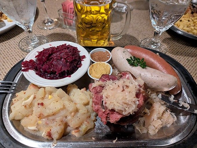 This platter of corned beef, sausage, sauerkraut, and potato pancakes is basically a Bavarian greatest hits album.