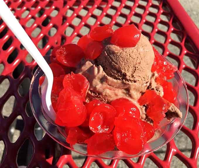 Chocolate custard topped with bright red cherries creates a color combination that makes your taste buds stand at attention.