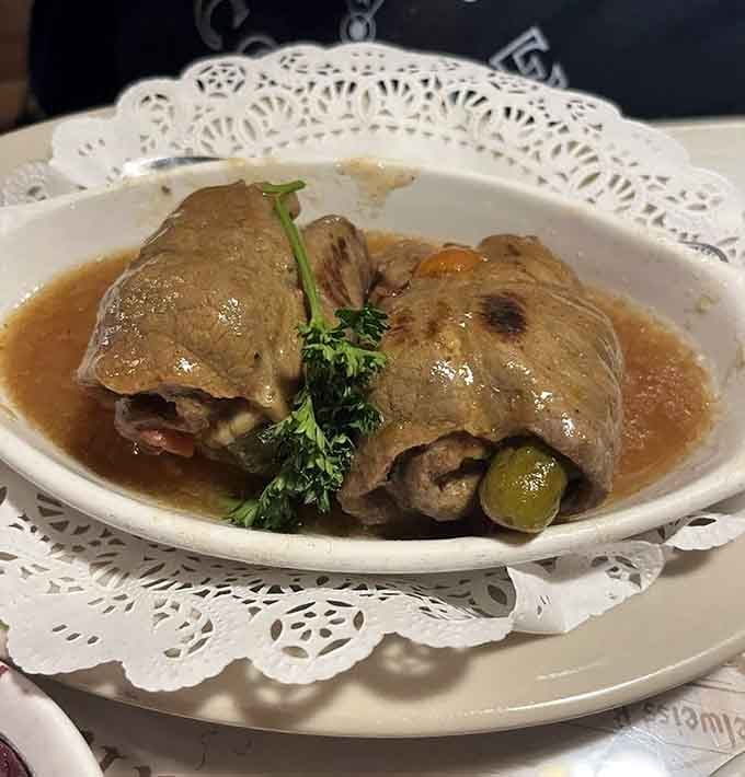Rindsrouladen: beef rolls stuffed with pickles, bacon, and pure genius, swimming in gravy that deserves its own fan club.