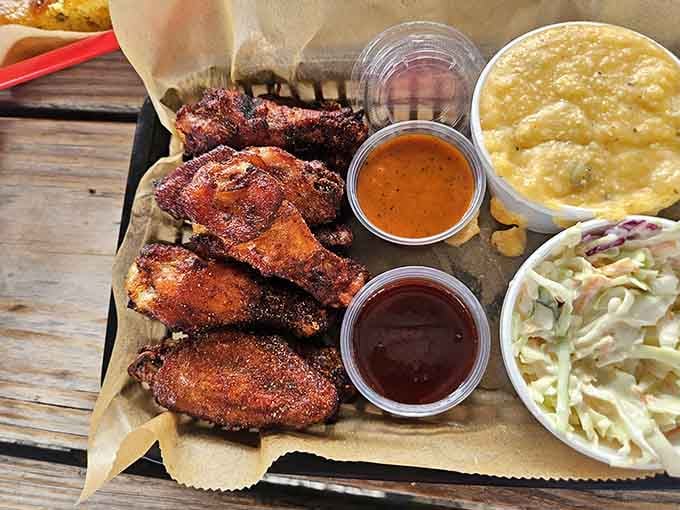 Smoked wings with sides create a tray of happiness that'll have you reconsidering everything you knew about poultry.