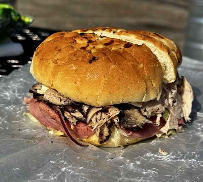 When pastrami and corned beef join forces on an onion roll, beautiful things happen that require extra napkins.