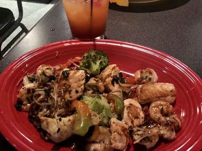 Shrimp and peppers sizzle together in this colorful creation that proves seafood belongs on the grill.