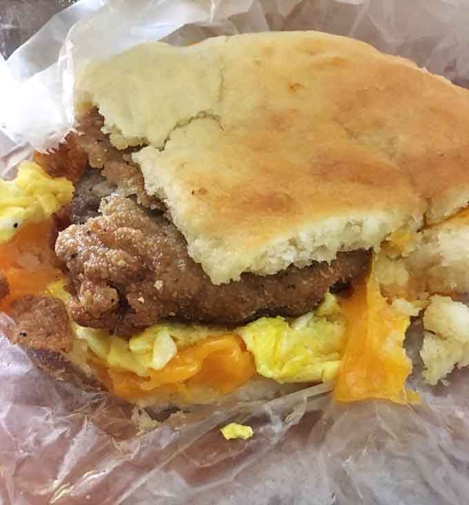 Steak, egg, and cheese nestled in a fluffy biscuit is how champions start their day, period.
