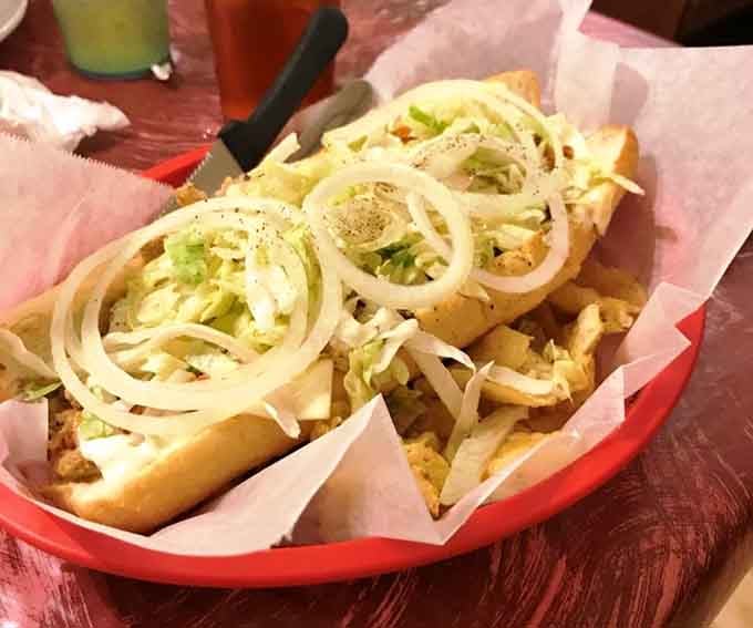 Buffalo chicken meets cheesesteak magic, topped with fresh onions that add the perfect crunch to every bite.