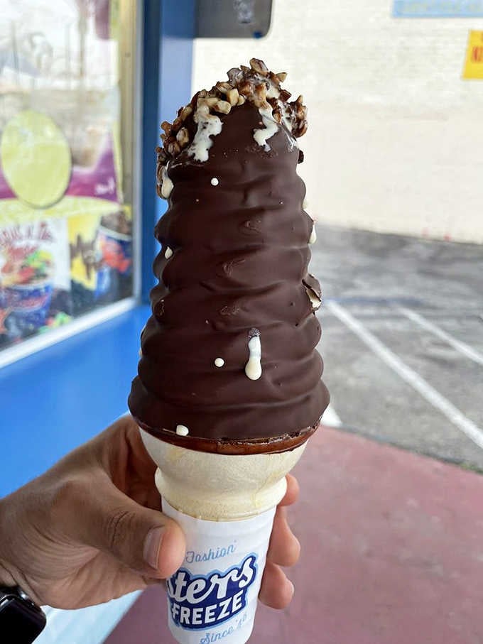 That chocolate shell coating isn't messing around, creating a crunchy jacket over creamy vanilla soft-serve perfection inside.