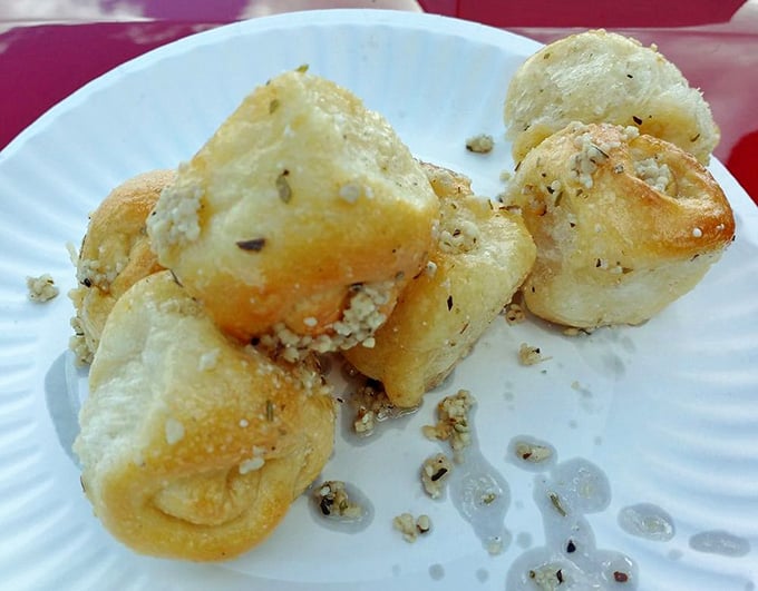 Golden, garlicky perfection that makes you understand why people order these by the dozen without hesitation.