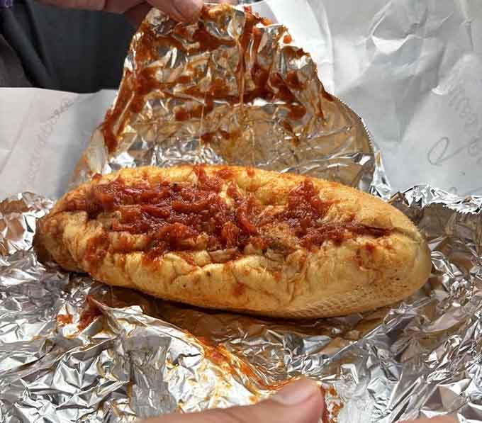 That meatball sub wrapped in foil looks like it could solve all your problems, or at least the hungry ones.