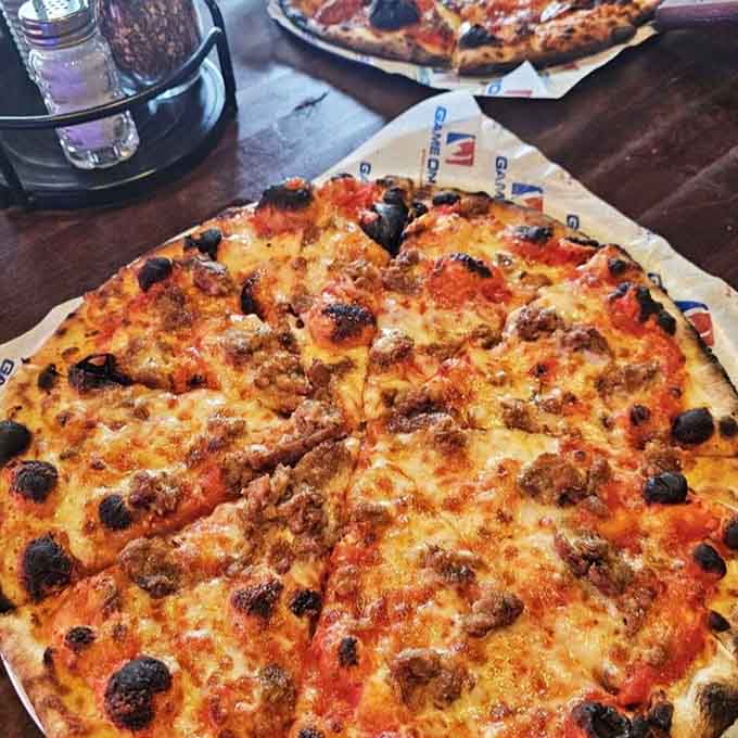 Charred edges and generous toppings make this pizza the MVP of your meal, no matter what's happening onscreen.