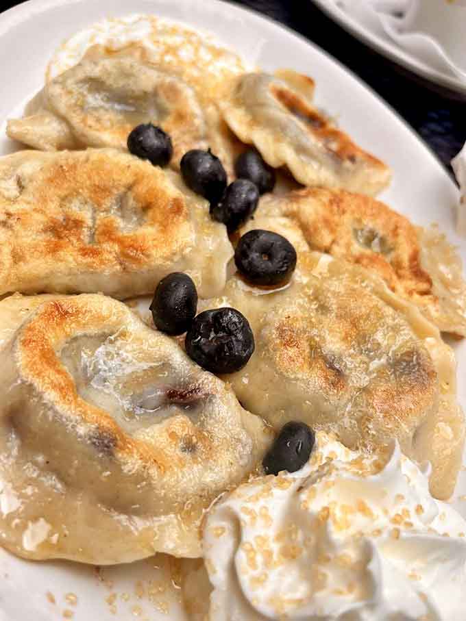 Blueberry pierogies with sour cream sound crazy until that first bite makes you a believer in culinary miracles.