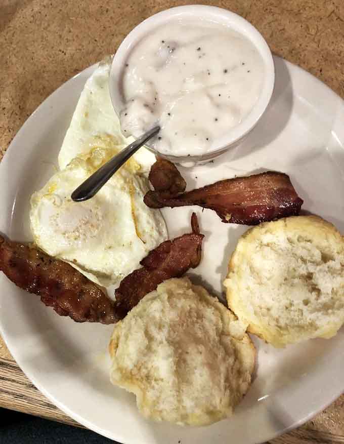 When biscuits and gravy come with perfectly cooked eggs and crispy bacon, you've found breakfast nirvana on a single plate.