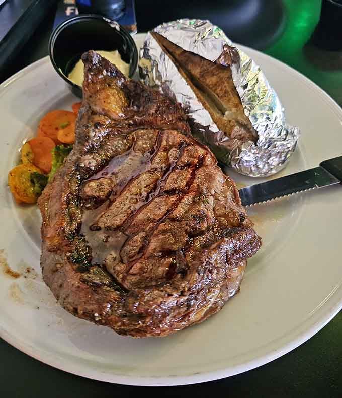 That's not just a steak, that's a beautifully charred masterpiece demanding your immediate and undivided attention.