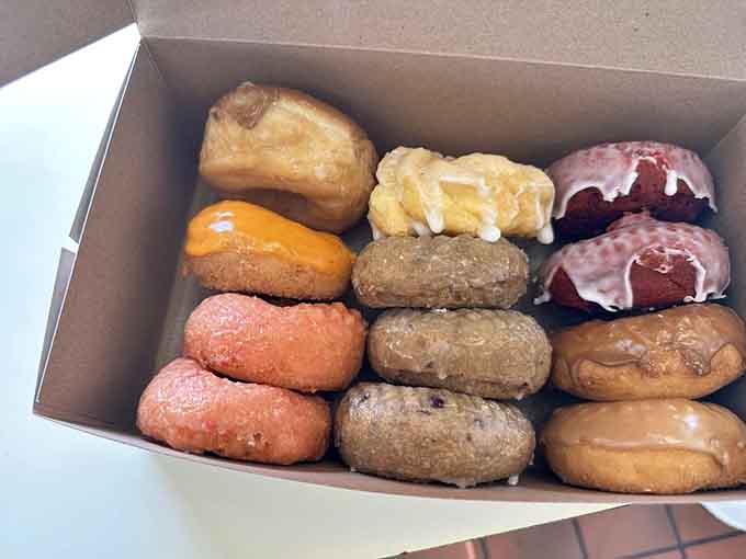 This colorful assortment looks like a pastry rainbow decided to take up residence in a takeout container.