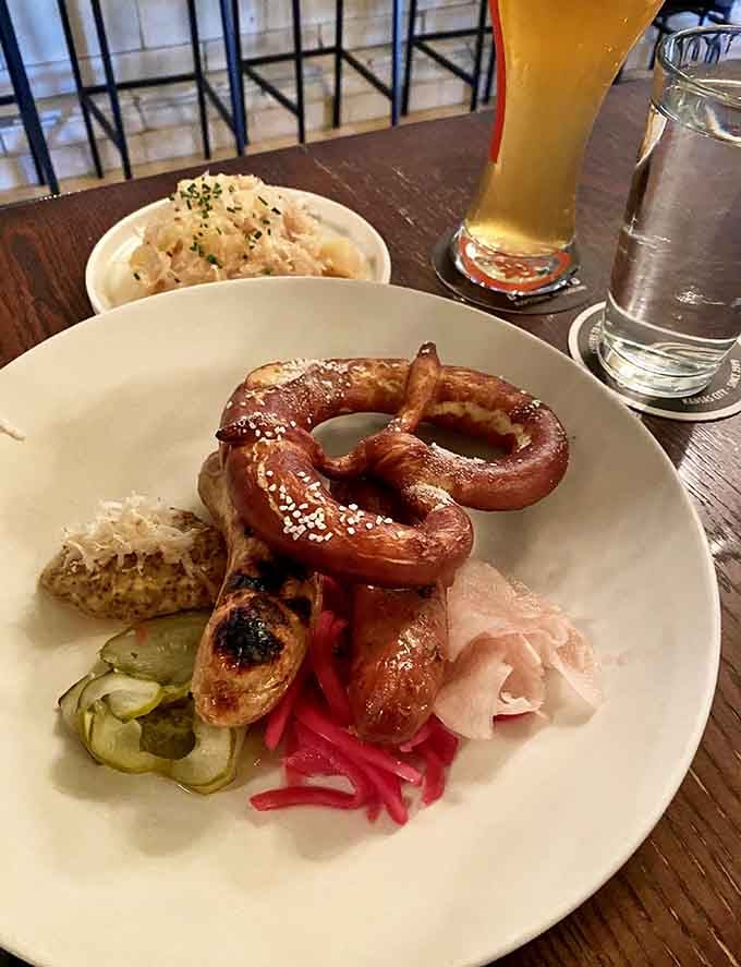 The W&uuml;rstlteller brings together sausages, pretzel, and all the fixings for a proper German feast on one glorious plate.
