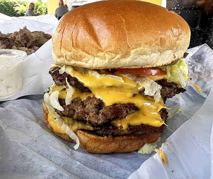 This triple cheeseburger doesn't believe in moderation, and frankly, neither should you when you're here.