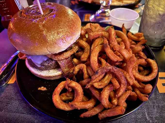 Crispy onion strings crown the Tarantula Burger, adding crunch and flavor that'll make you forget the creepy-crawly namesake.