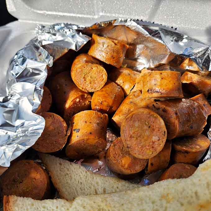 Sliced sausage with that perfect snap and smoky char, the unsung hero of every great barbecue spread.