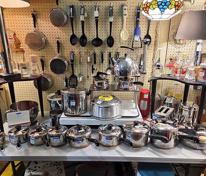 Vintage cookware that could outfit a professional kitchen, all shining and ready for their next culinary adventure.