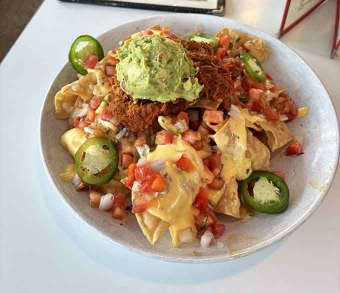 Nachos topped with pulled pork prove that fusion cuisine existed long before it became a trendy buzzword.