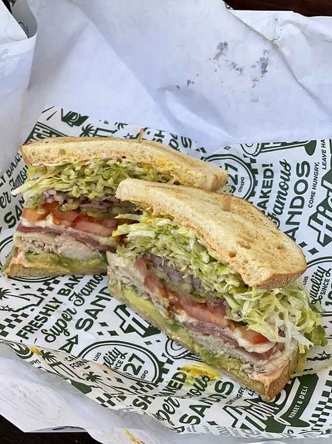 The Hooligan stacked high on sourdough proves that sometimes breaking the rules leads to delicious consequences.