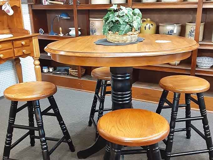 This solid wood table and stools combo survived decades and could easily handle another family's worth of Sunday dinners.